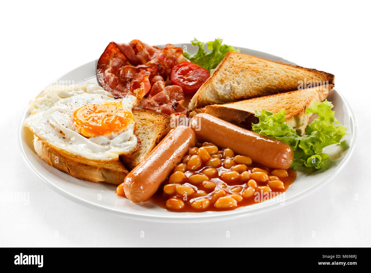 English breakfast - toast, egg, bacon and vegetables Stock Photo - Alamy