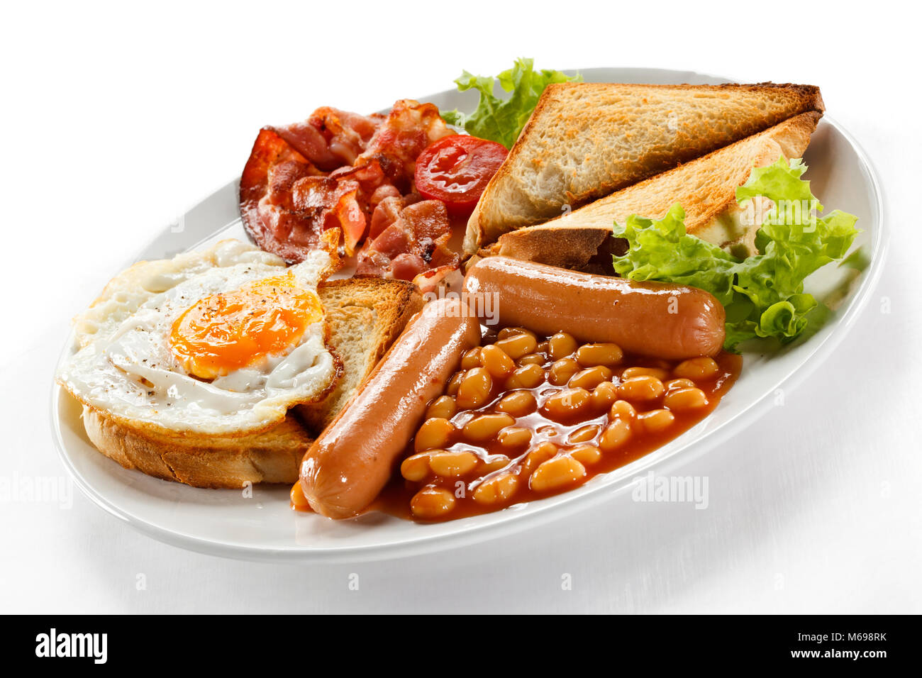English breakfast - toast, egg, bacon and vegetables Stock Photo - Alamy