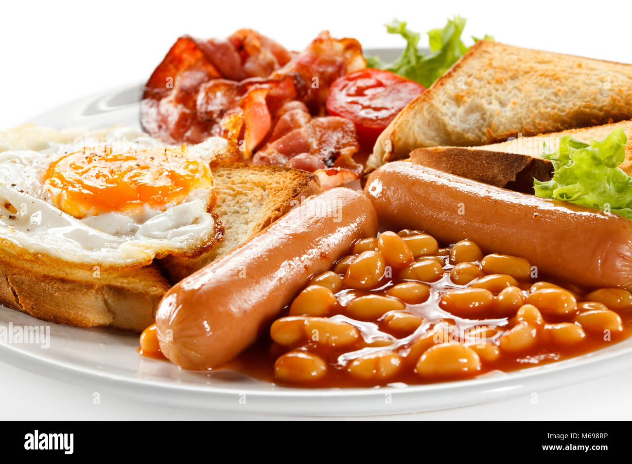 English breakfast - toast, egg, bacon and vegetables Stock Photo - Alamy