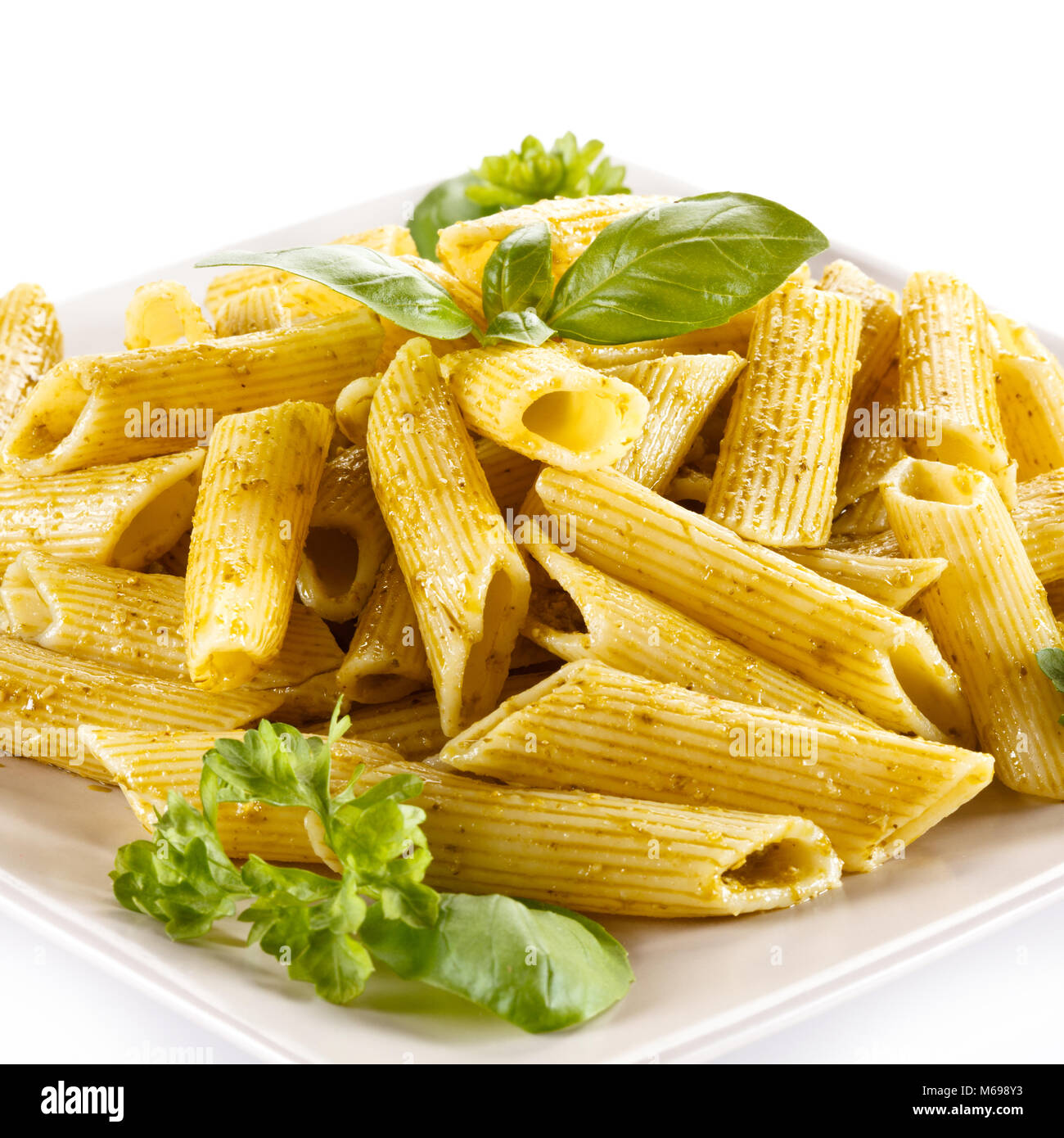 Penne, pesto sauce and vegetables Stock Photo - Alamy