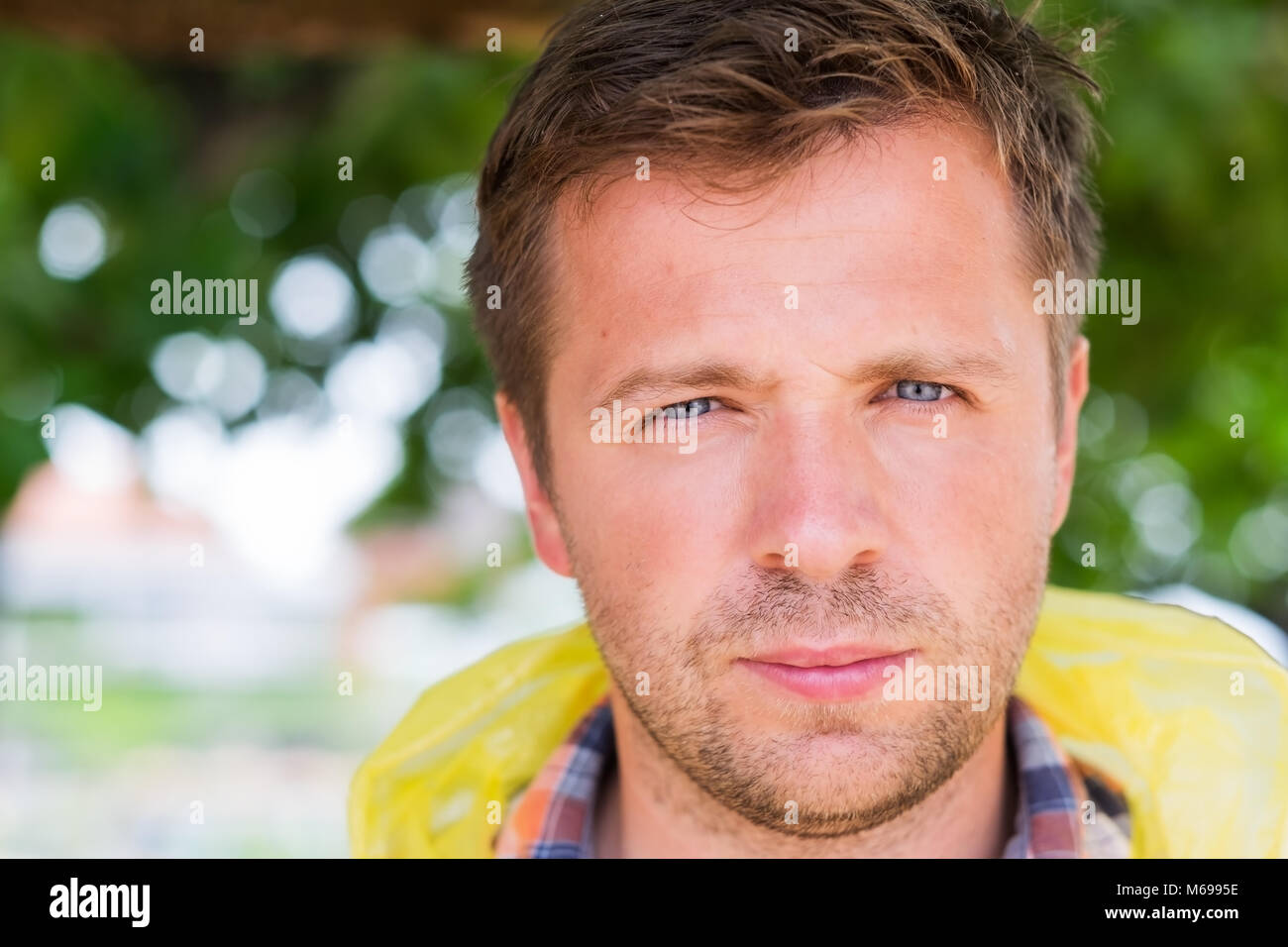 people facial expression concept . Close up portrait of serious smiling ...