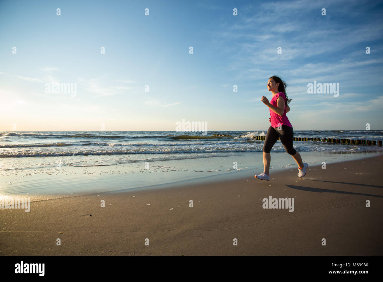 Sporty teenagers jumping hi-res stock photography and images - Alamy