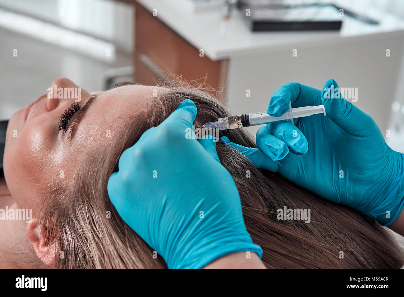 cosmetic injections to strengthen the hair Stock Photo - Alamy