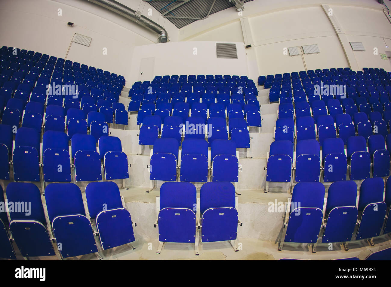 Empty stands at the stadium blue hockey Stock Photo - Alamy
