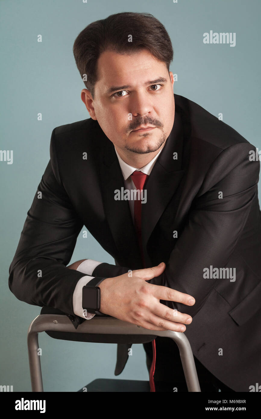 Portrait of business man in classic stylish suit. Indoor, studio shot ...