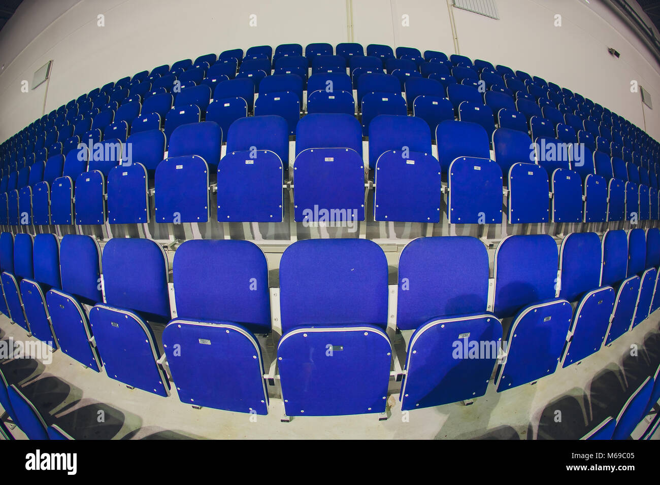 Empty stands at the stadium blue hockey Stock Photo - Alamy