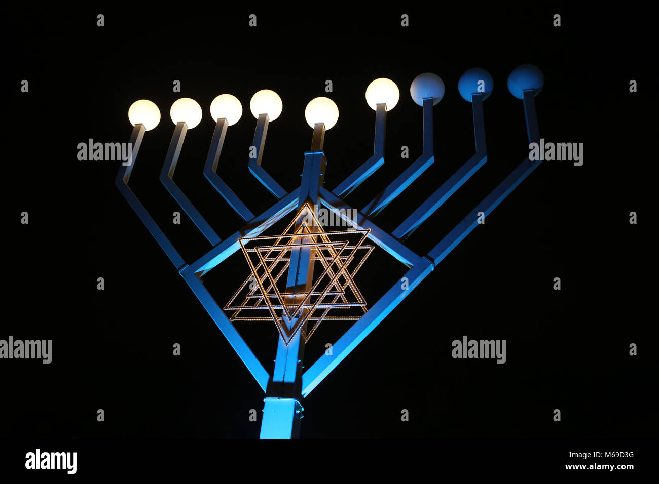 A Hanukkiah, A Menorah with nine branches Stock Photo - Alamy