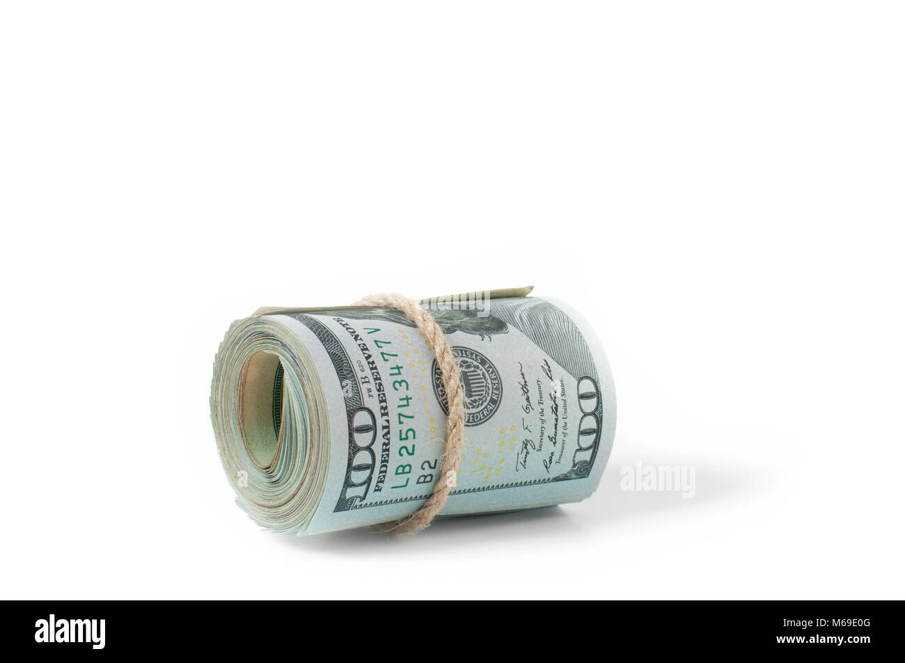 Money. Roll of dollars isolated on white Stock Photo - Alamy