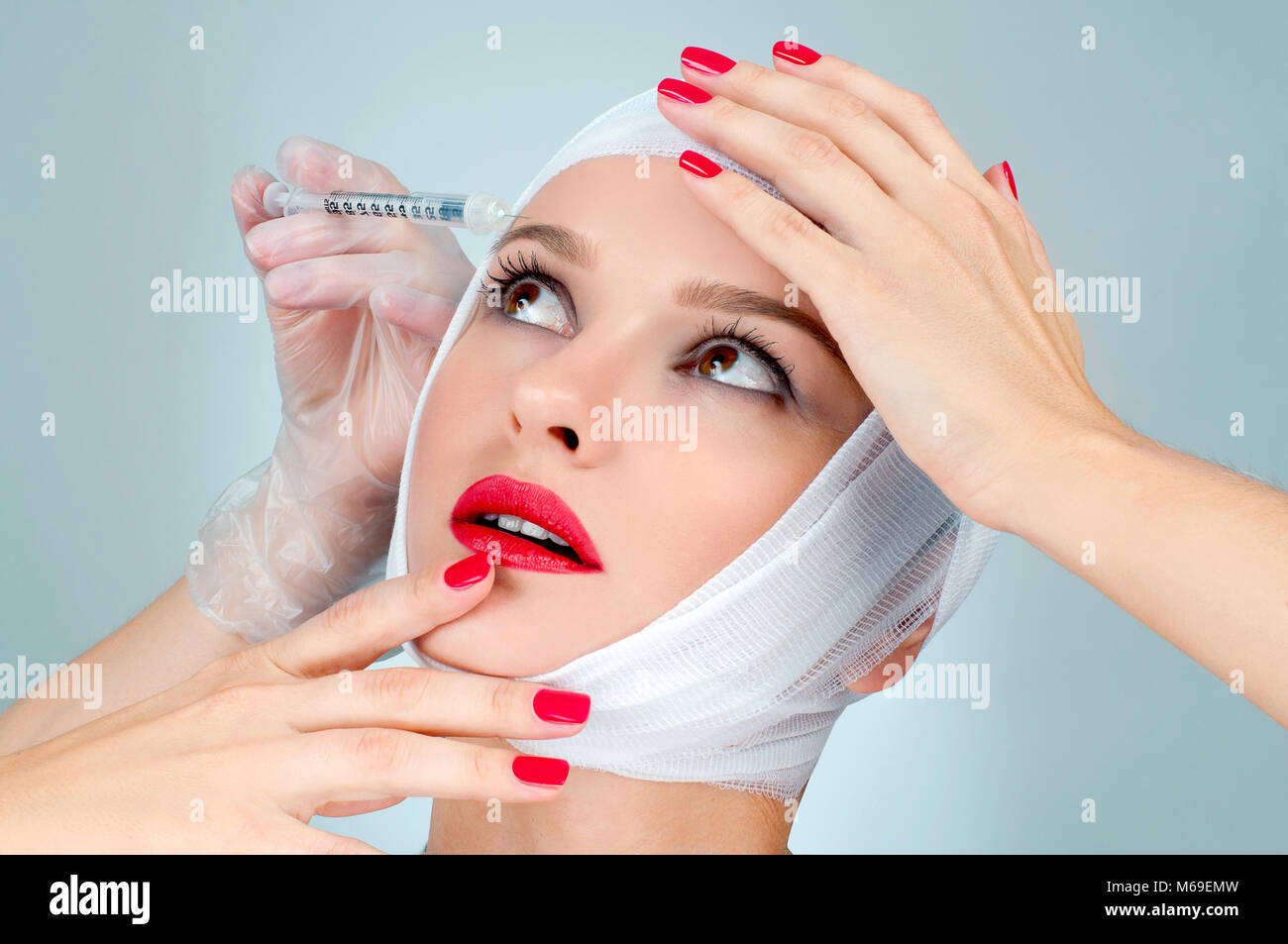 Patient in bandages. Beautiful woman after plastic surgery with ...