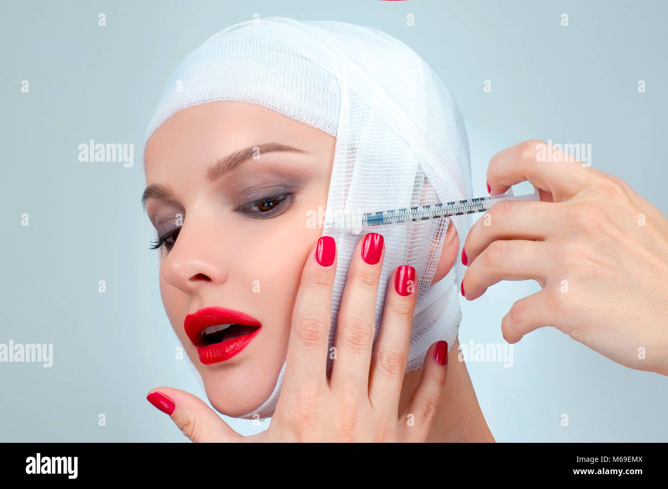 Patient in bandages. Beautiful woman after plastic surgery with ...
