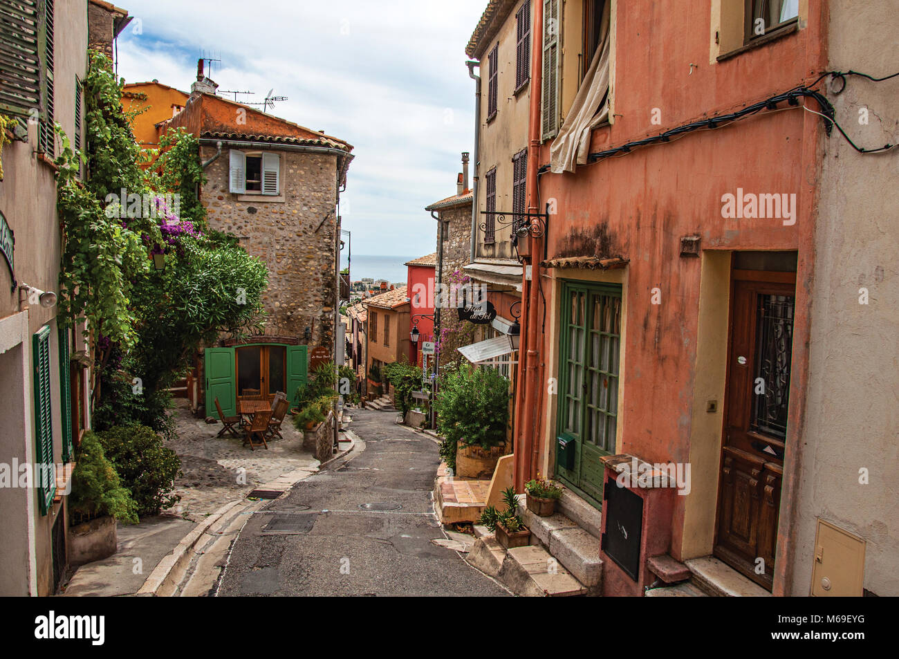 View of alley with houses in Haut-de-Cagnes, a pleasant village on top ...