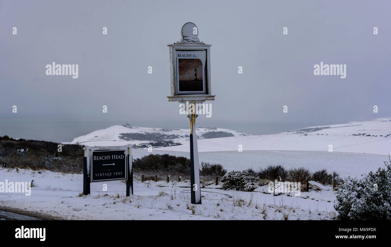 Beachy Head pub sign with snowy Seven Sisters in background Stock Photo ...