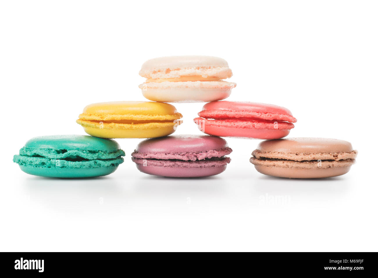 Bright colored macaroons pyramid. Side view isolated on white Stock ...
