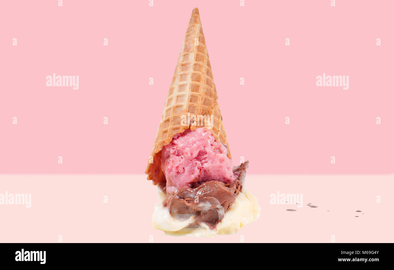 Ice cream on the ground. Chocolate, vanilla and strawberry ice cream ...