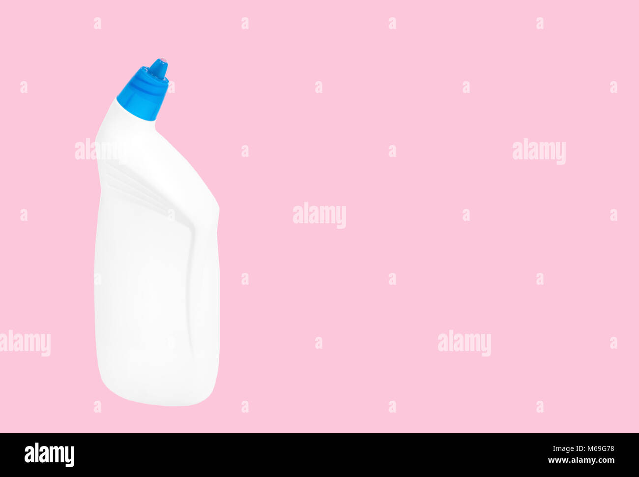 Plastic bottle with washing detergent for toilet on pastel pink ...