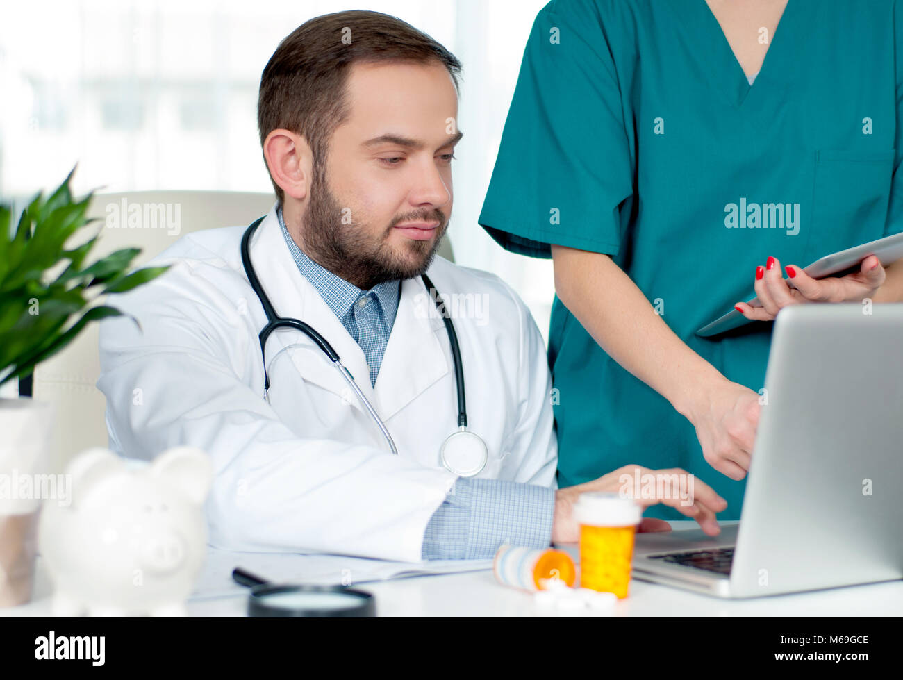 Doctor concept. Doctors discussing a patient diagnose. Doctor sitting ...