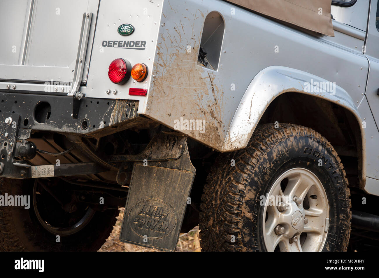 Land Rover Defender off road in muddy conditions Stock Photo - Alamy