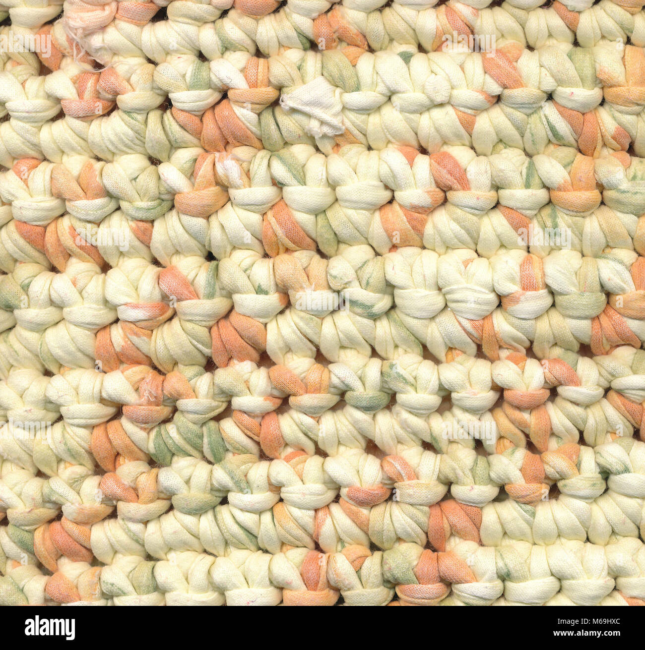 Abstract background - closeup of crochet rag rug in light colours Stock ...