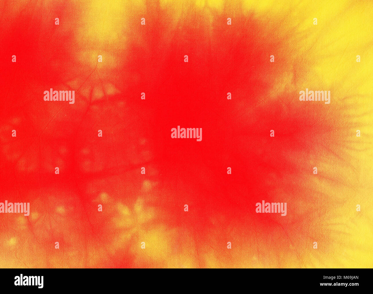 Textile background - Batik in red and yellow colours Stock Photo - Alamy