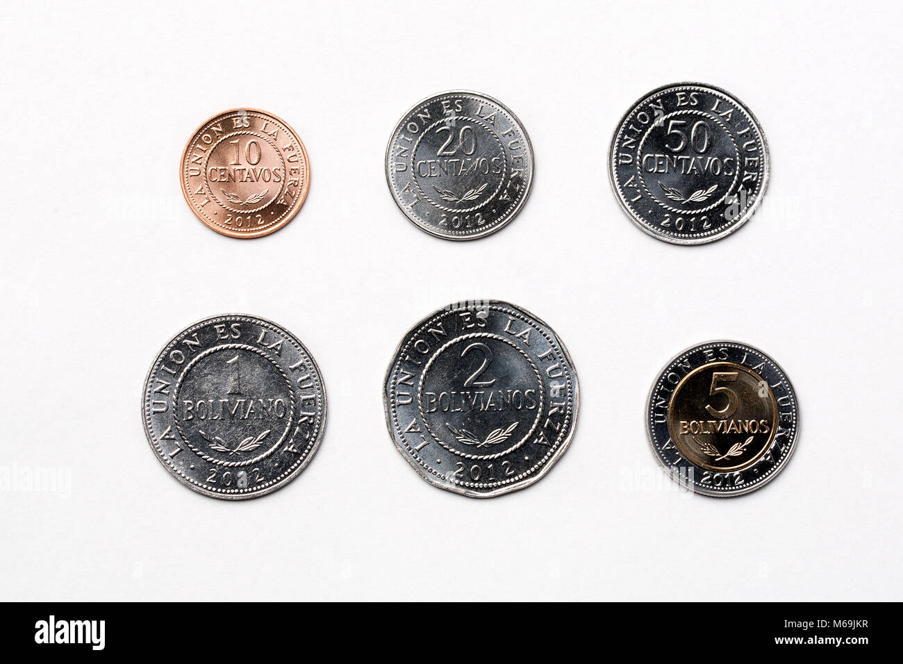 Bolivian coins on a white background Stock Photo - Alamy
