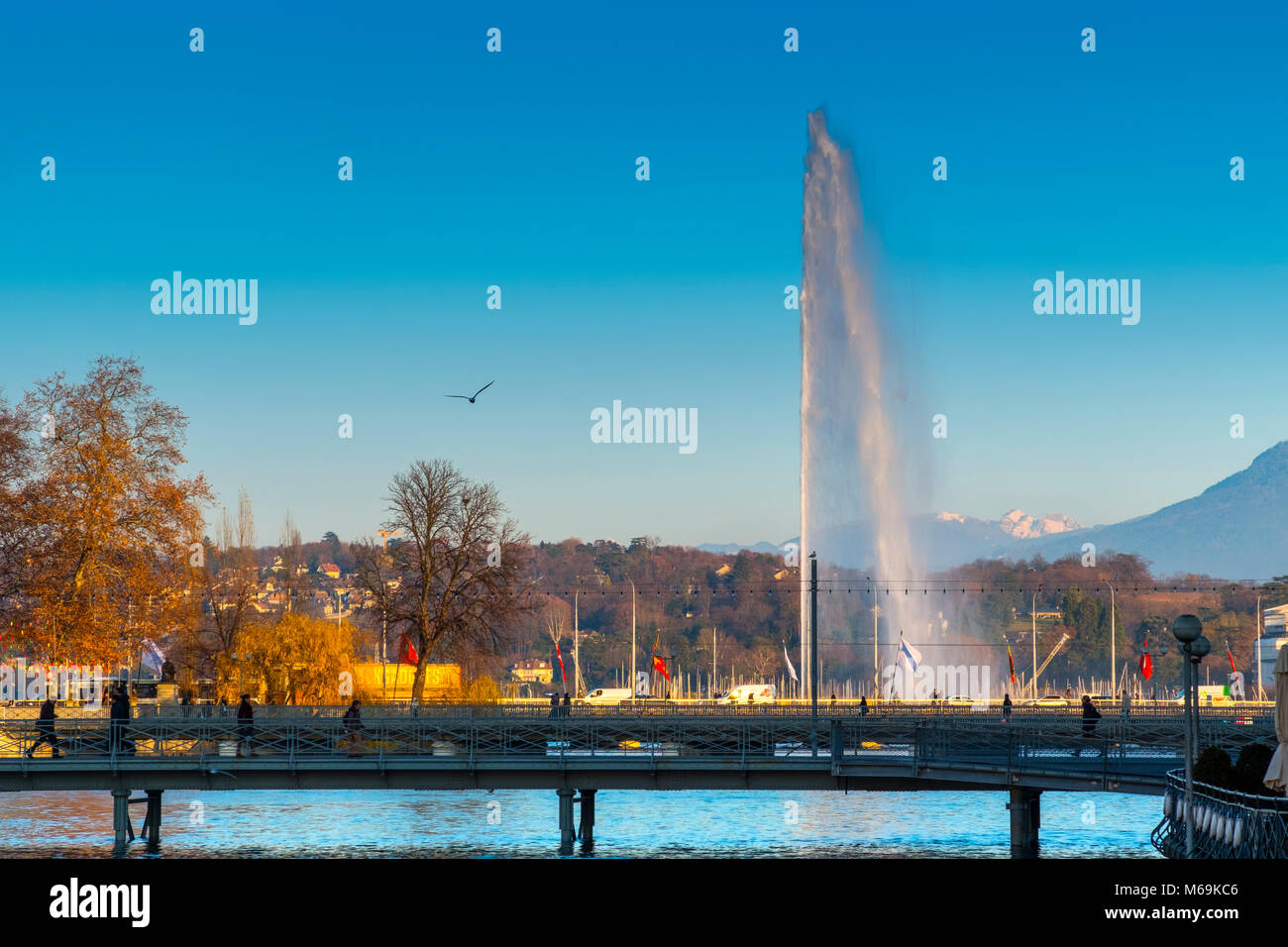 Famous fountain at Leman Lake called Jet d'Eau. Old town, historic ...