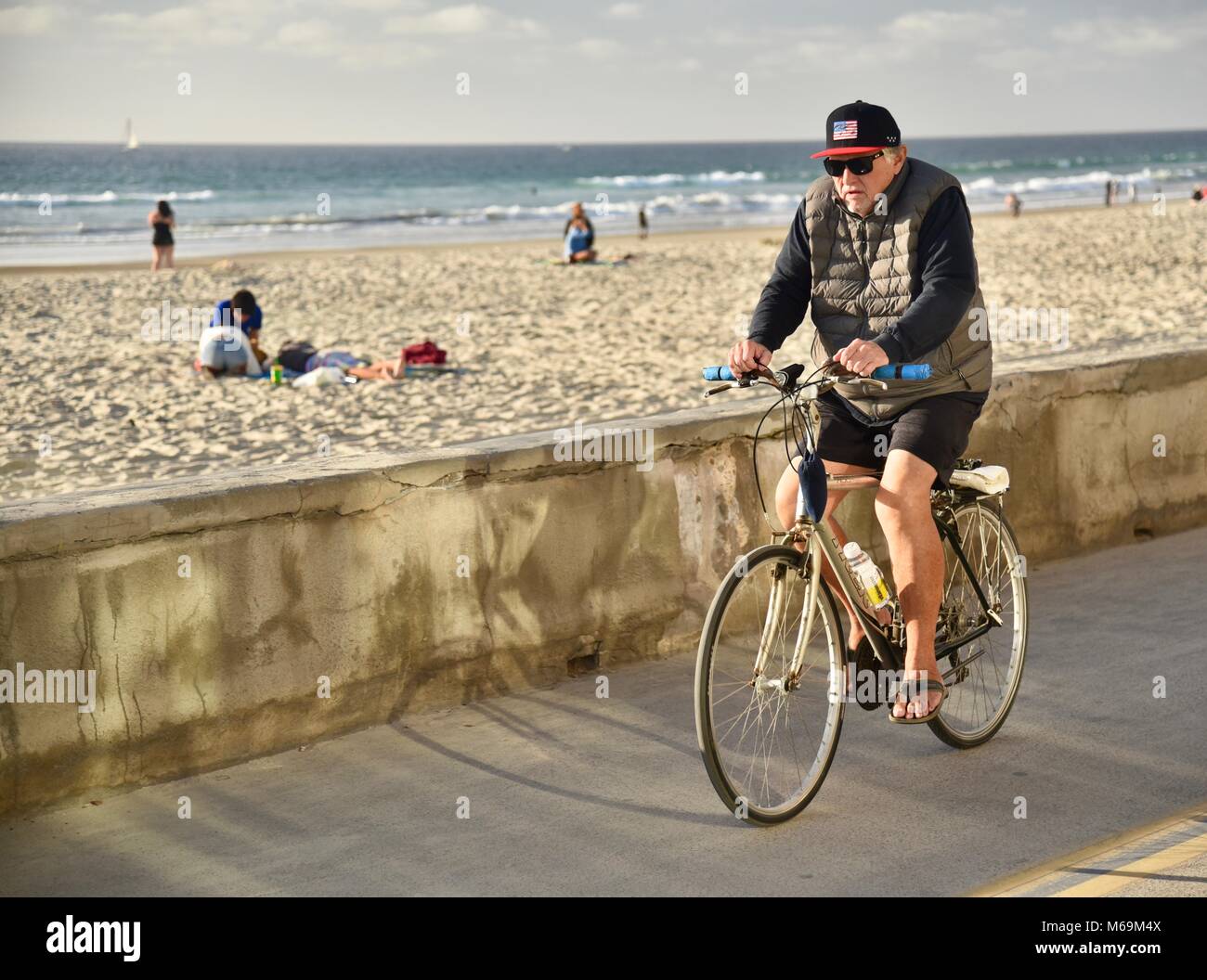 Man pedaling bicycle hi-res stock photography and images - Alamy
