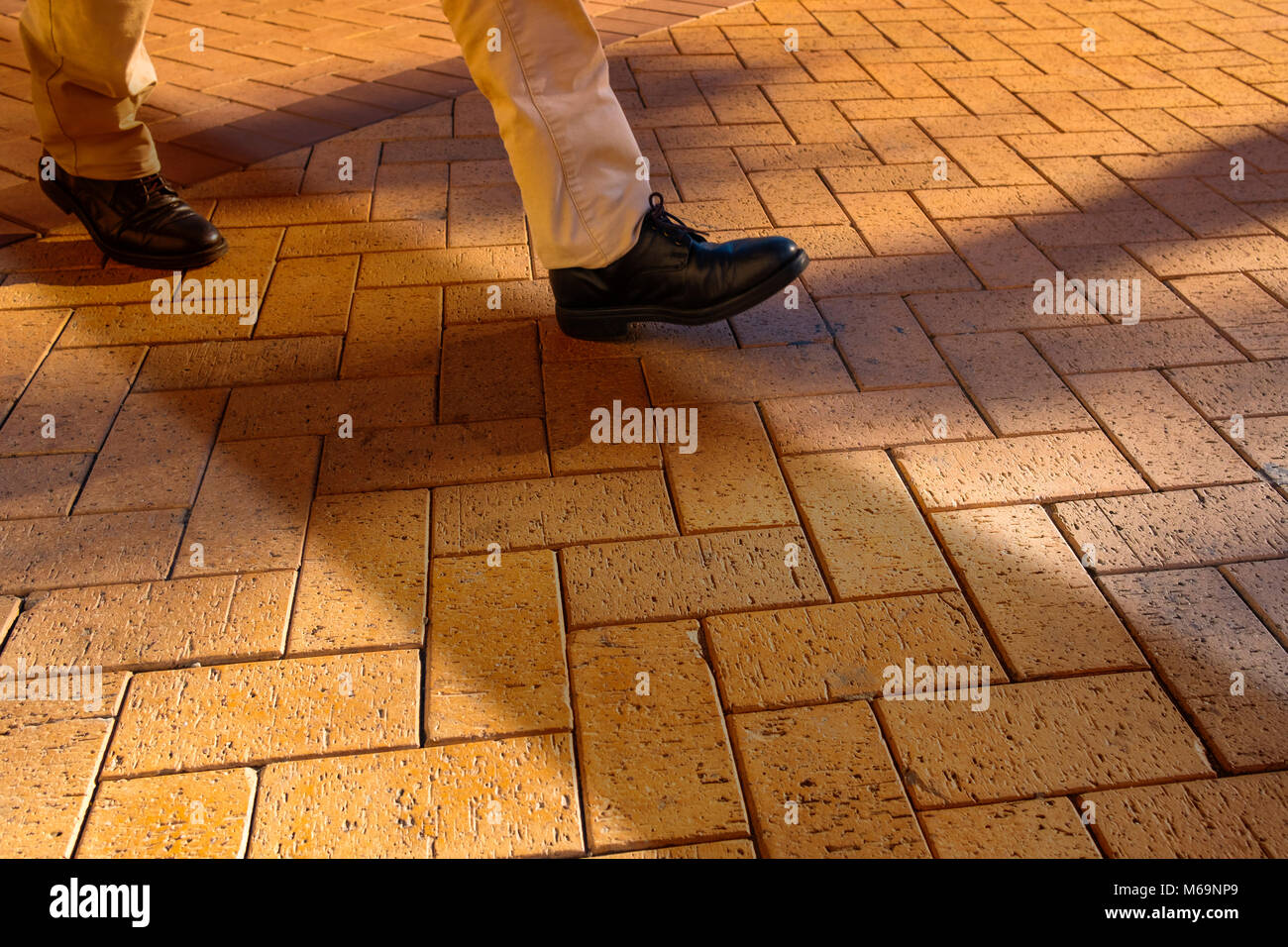 Legs of person walking Stock Photo - Alamy