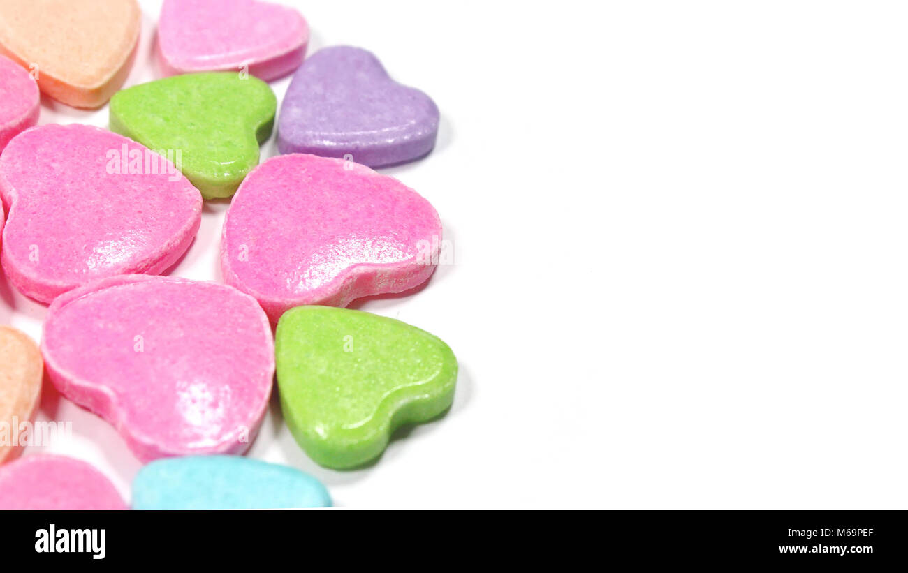 Closed up isolated group of colorful love candy Stock Photo - Alamy