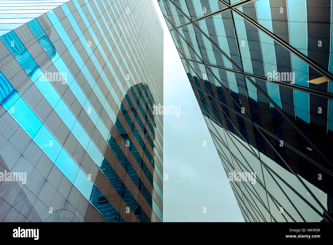 Reflections of modern commercial buildings on glasses Stock Photo - Alamy