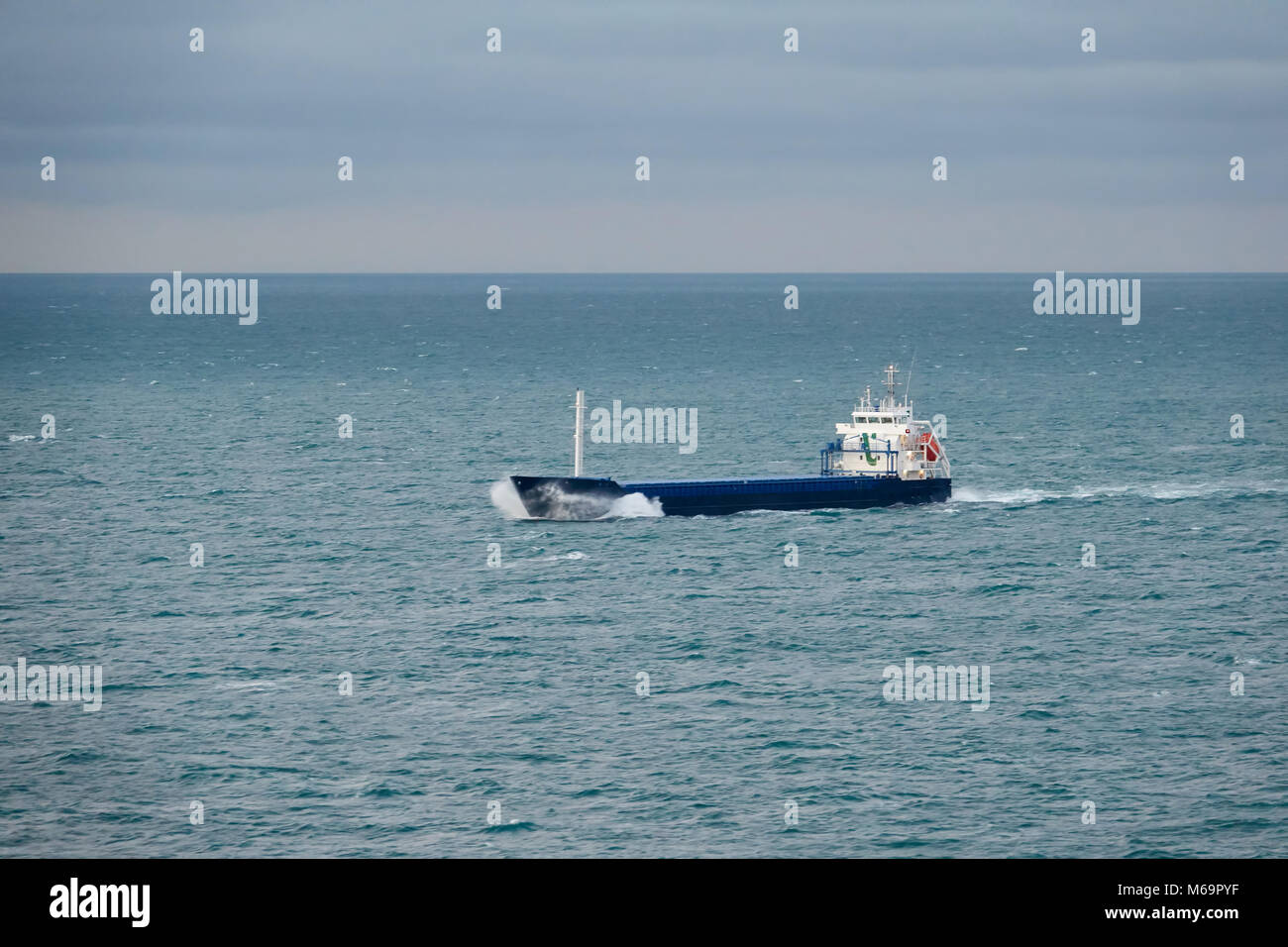 Container ship without cargo in the sea Stock Photo - Alamy