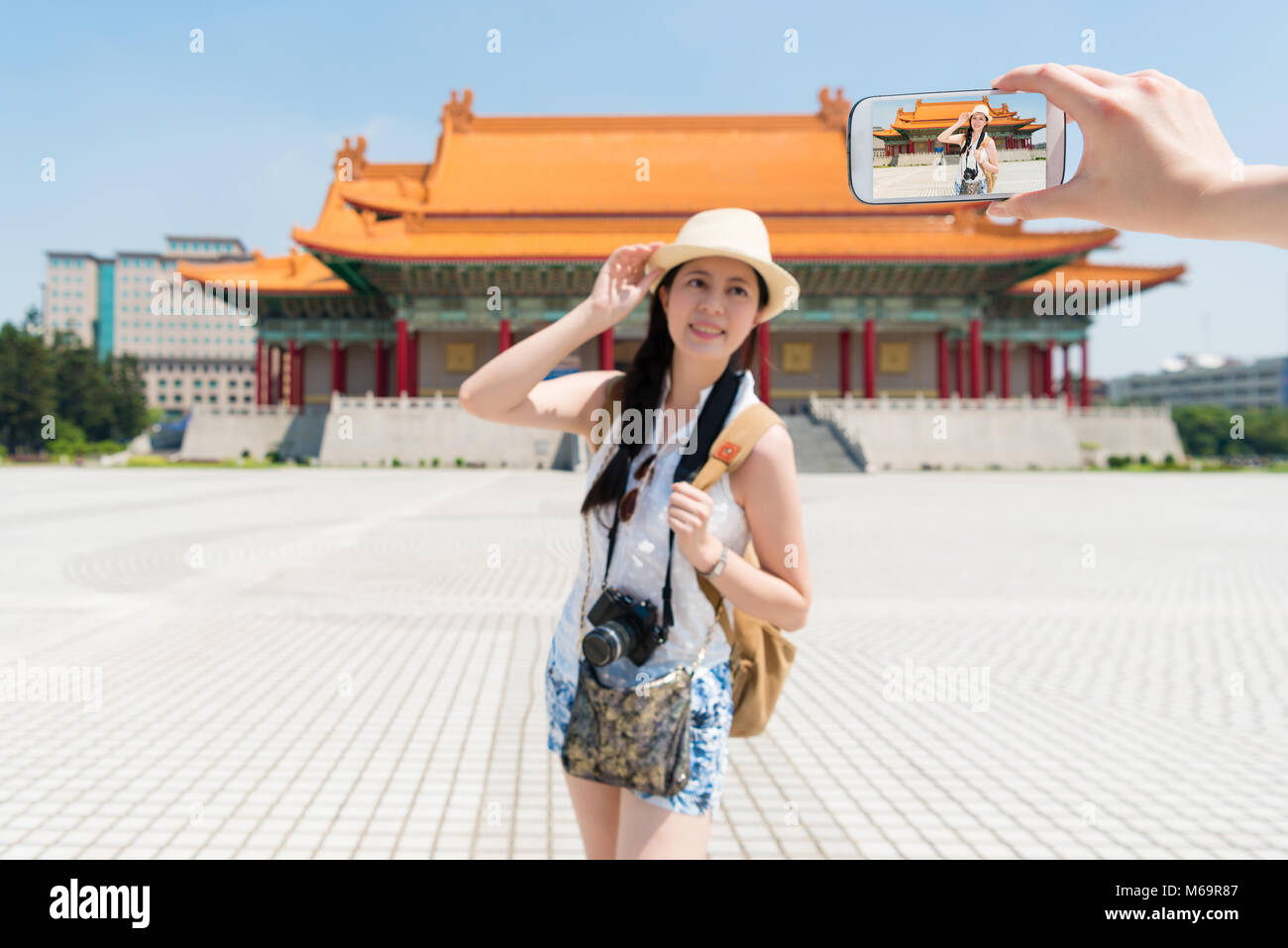 Modern Asian teem taking photos in front of Chiang Kai-shek Memorial ...