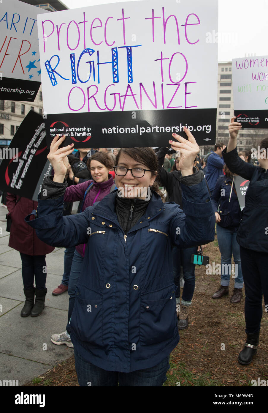 "Protect the Right to Organize" reads the sign. Union activists rally ...