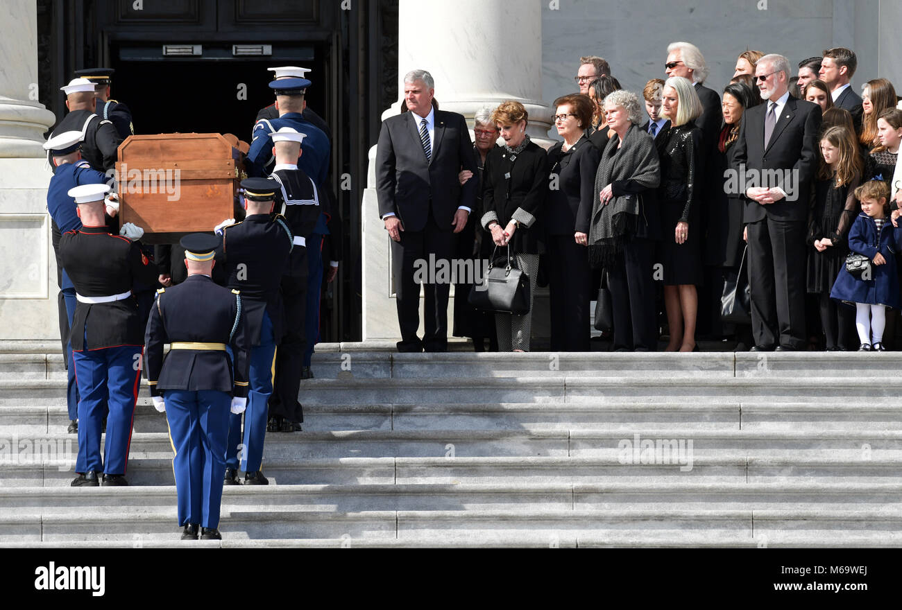 The family of Rev. Billy Graham watches as the casket of Rev. Billy ...