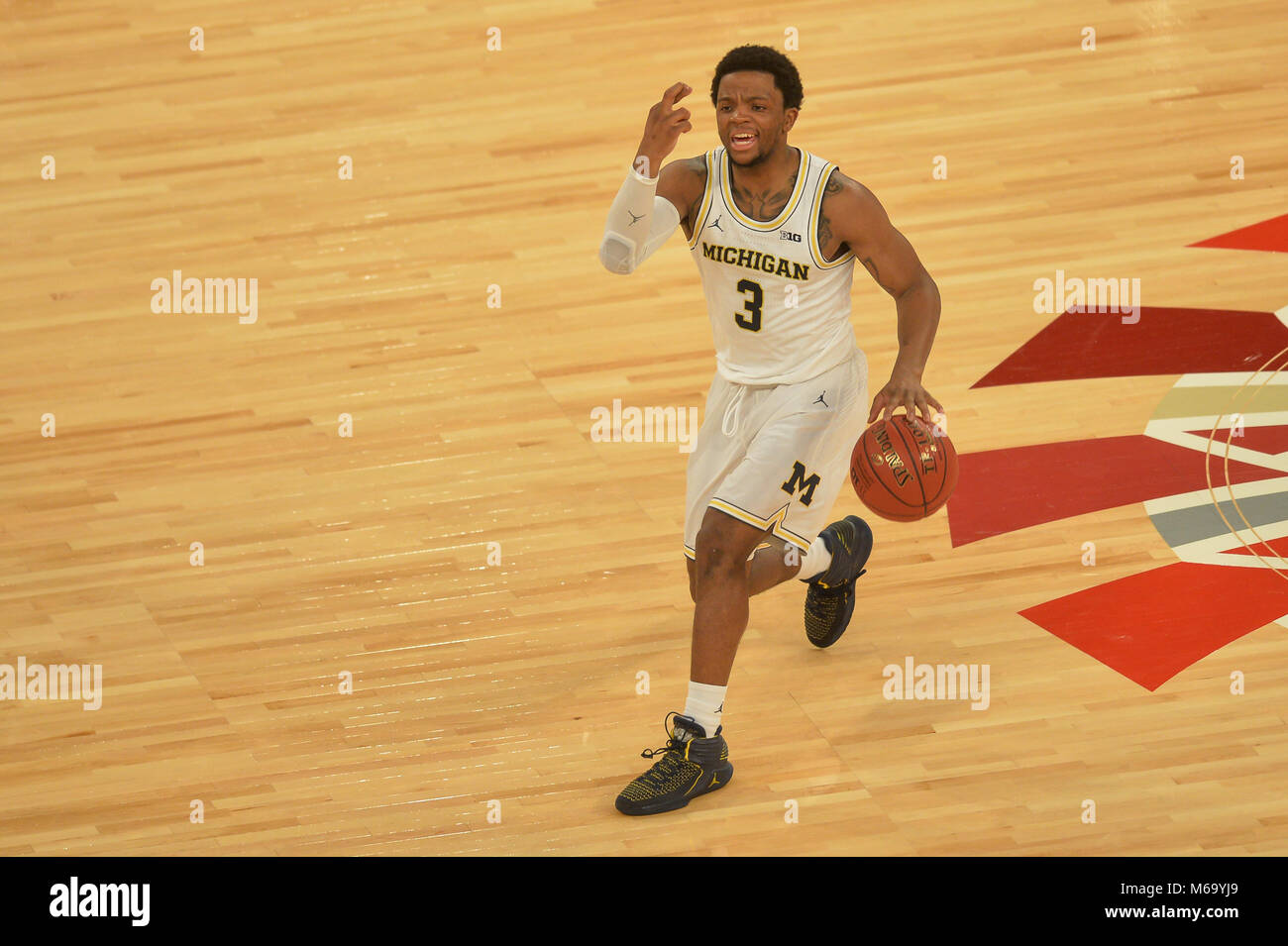 New York, New York, USA. 1st Mar, 2018. ZAVIER SIMPSON (3) signals to a ...