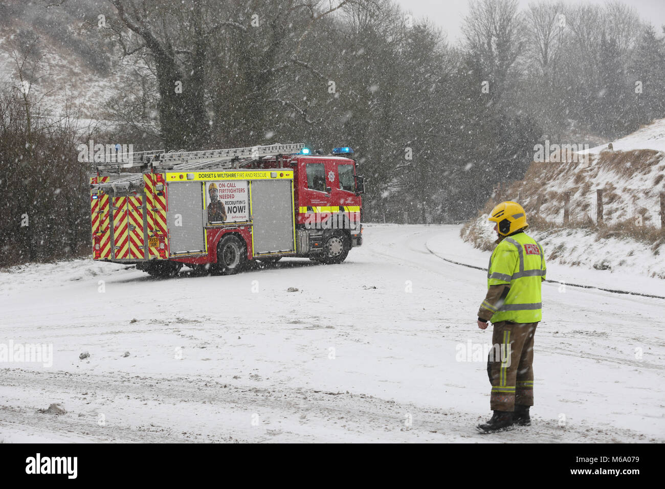 Corfe Castle, UK. 1st Mar, 2018. Dorset Fire and Rescue officers direct ...