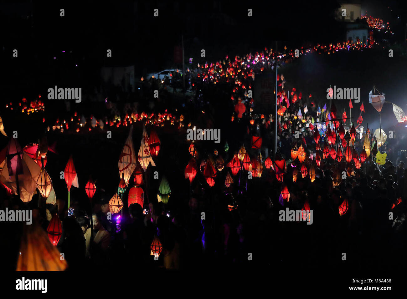 Nanchong. 2nd Mar, 2018. People parade with frog-shaped lanterns in ...