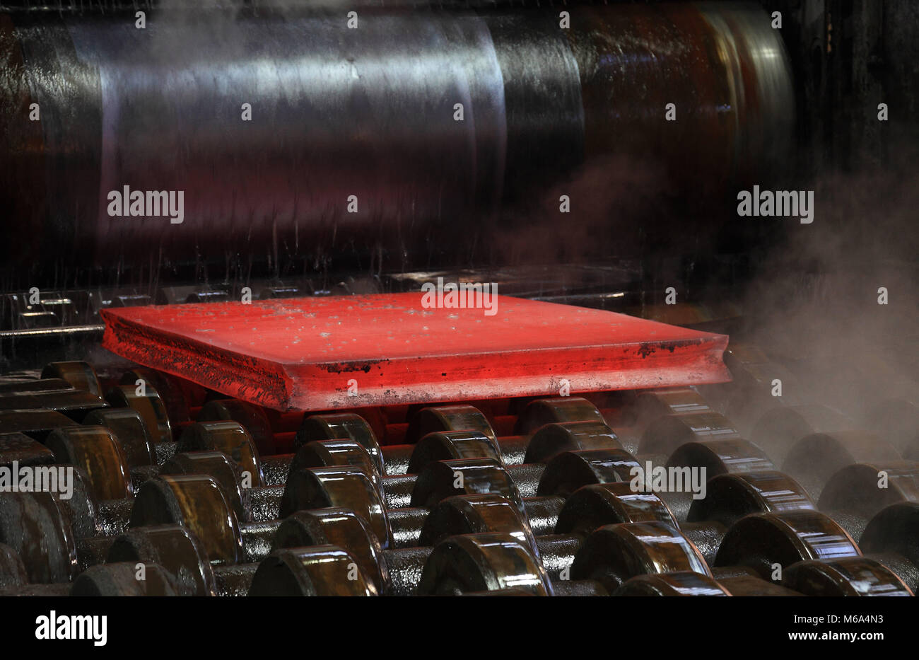 Hettstedt, Germany. 25th Feb, 2015. A copper plate is being processed ...