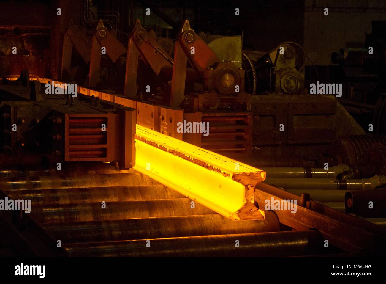 Gleaming steel beam pictured rolling hi-res stock photography and ...