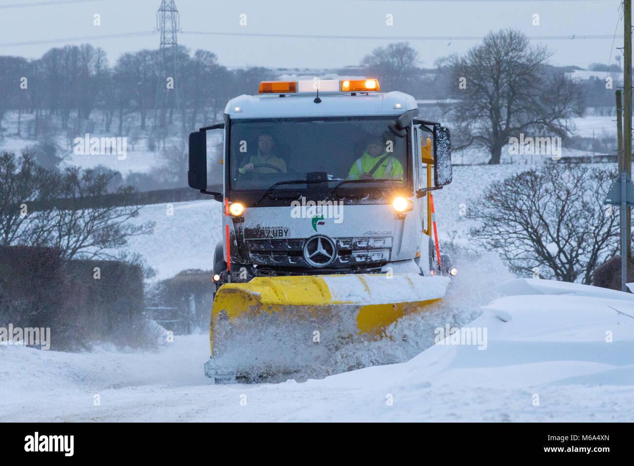 A Flintshire Council gritting vehicle and snow plough clearing the main ...