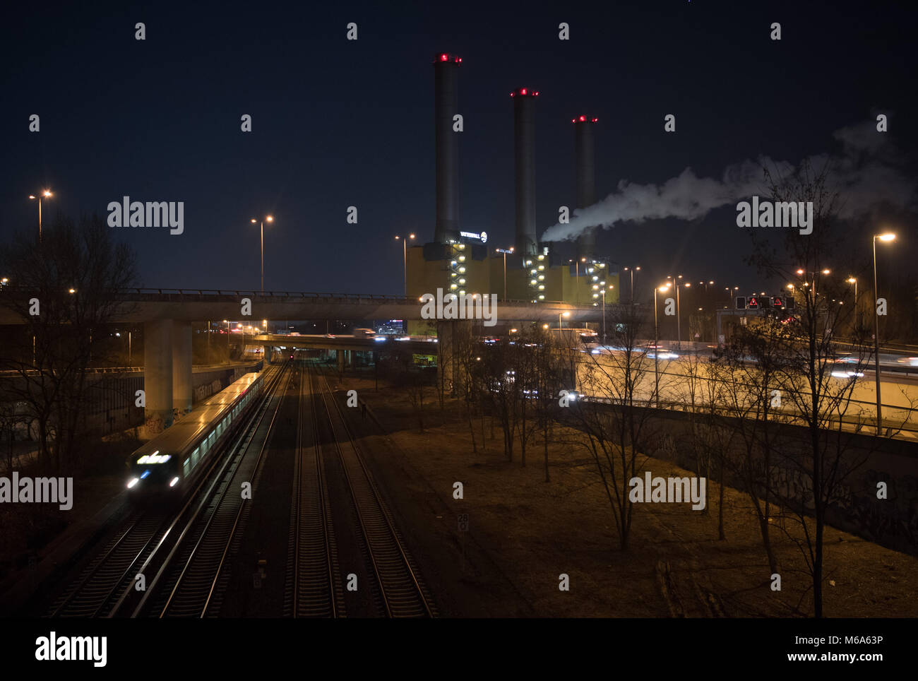 01 March 2018, Germany, Berlin: A train of the S-Bahn drives next to ...