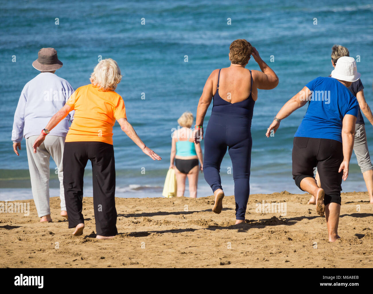 Pensioners daily keep fit class on beach in Spain Stock Photo - Alamy