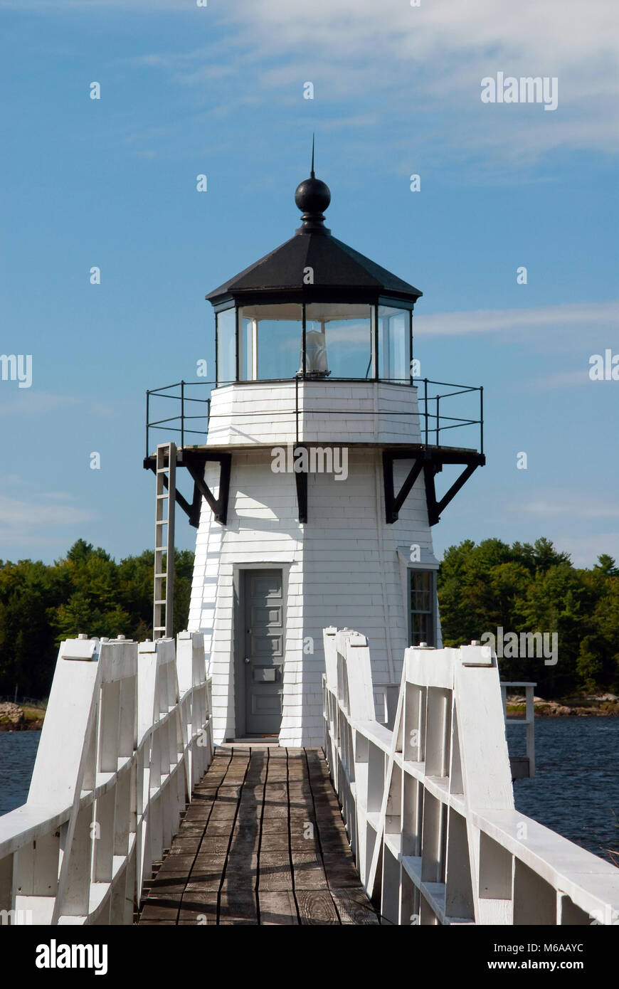 Old wooden walkway leads to lighthouse on Kennebec River, in Maine ...