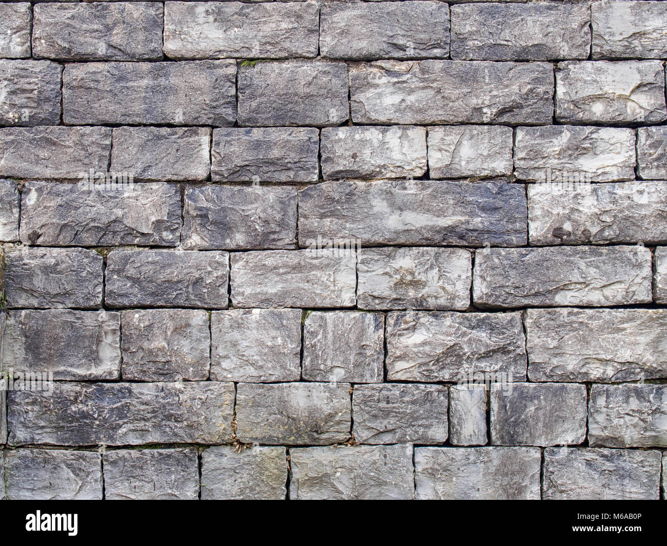 Real medieval gray brickwall masonry background Stock Photo - Alamy