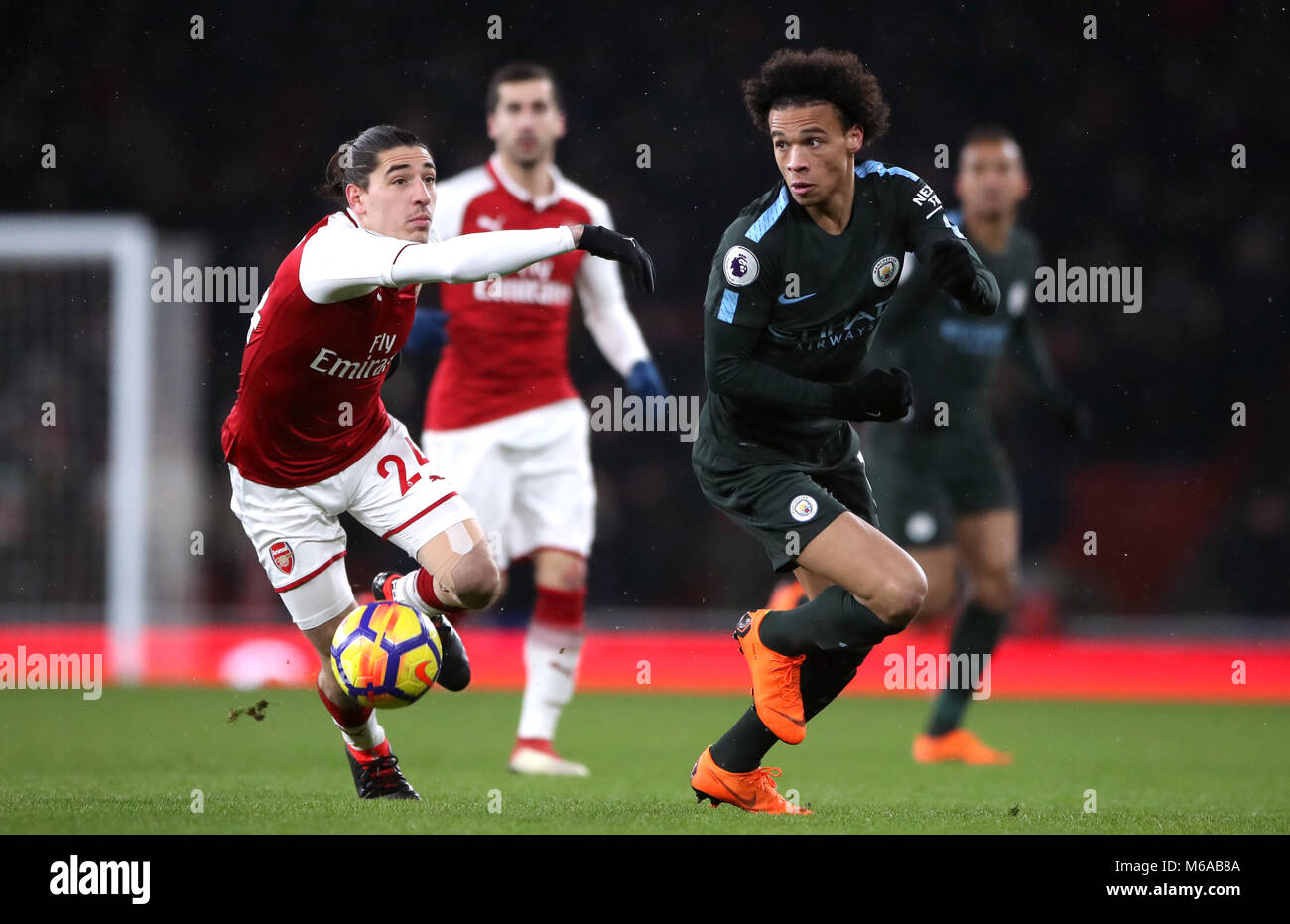 Arsenal's Hector Bellerin (left) and Manchester City's Leroy Sane ...