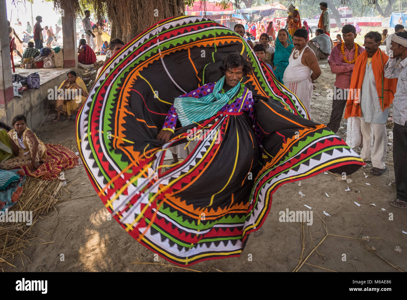 A man dancing and twirling about just before the Kartika Purnima (Deva ...