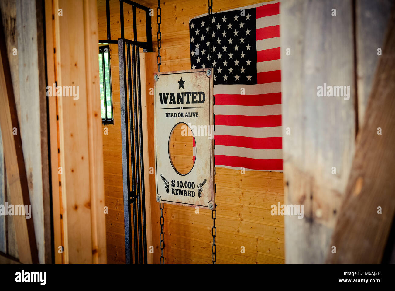 Texas jail wanted sign with American Flag in the background Stock Photo ...