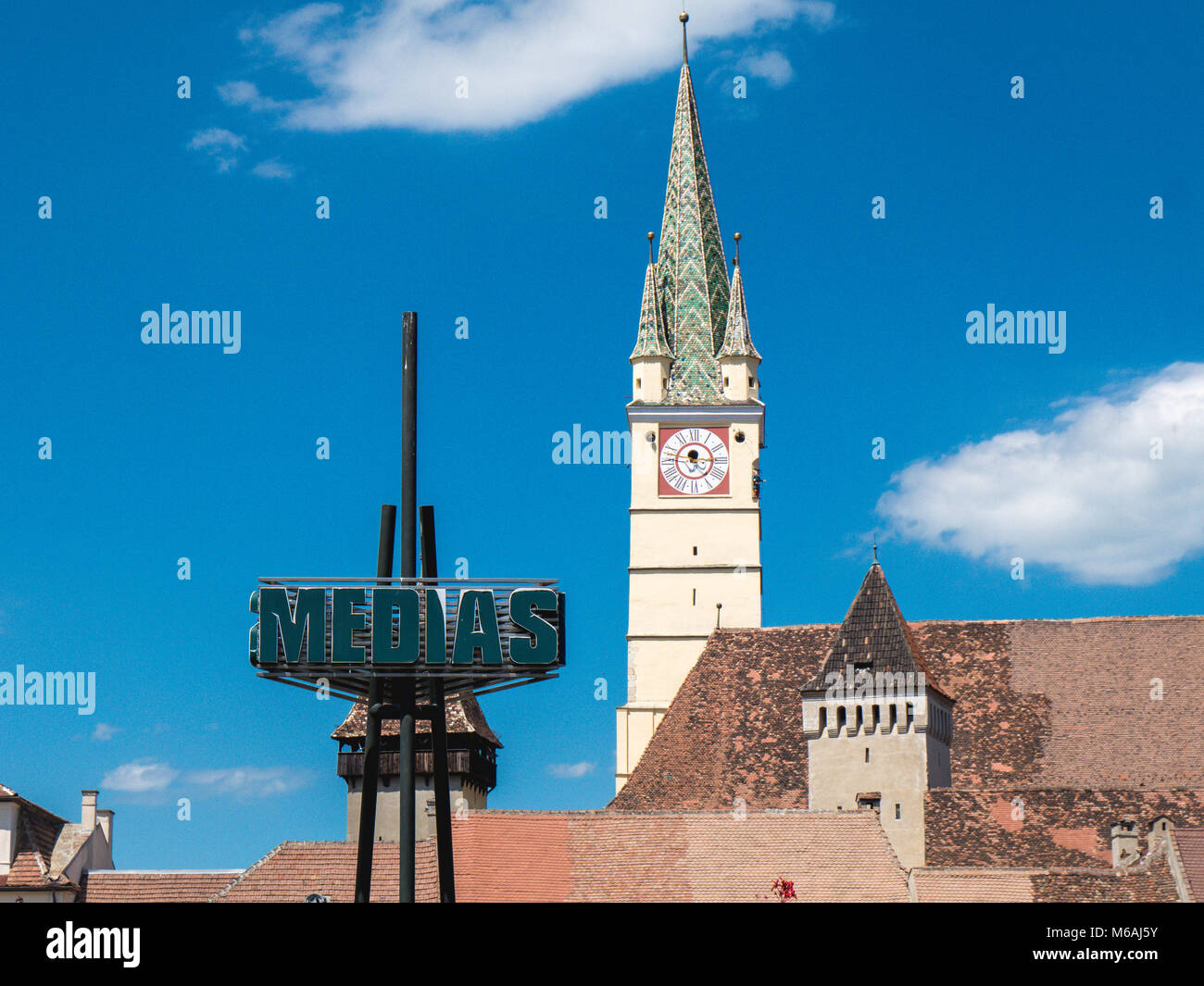 Medias Romania city symbol. Old saxon Cathedral clock tower in the city ...