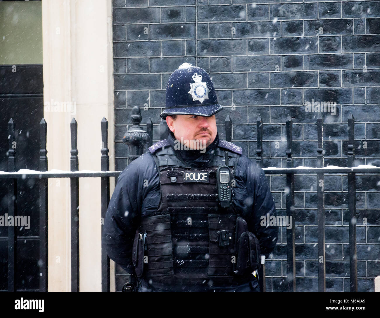 A Policeman patrols in the snow in Downing Street.The Metropolitan ...