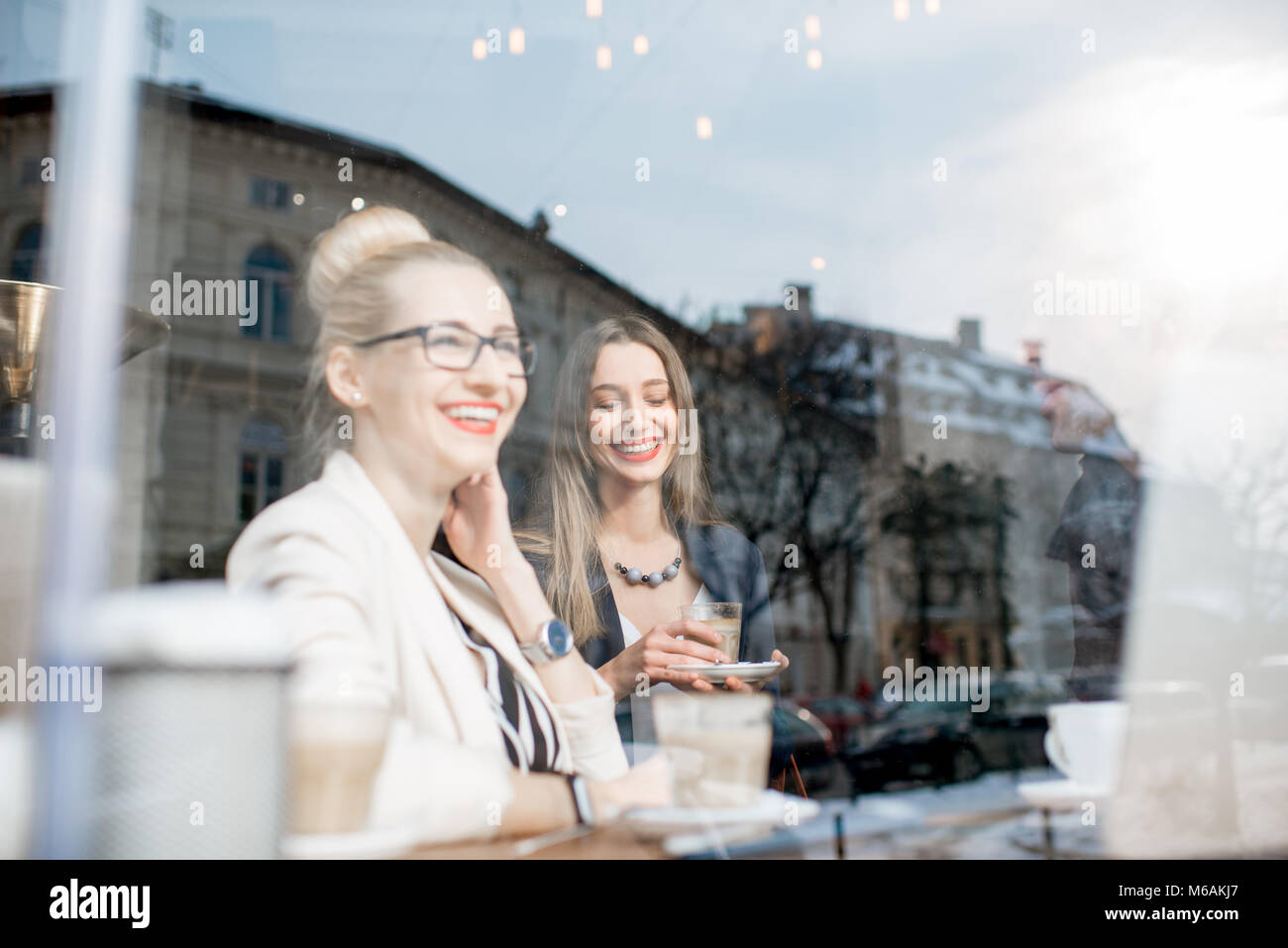 View through the window on the business people indoors Stock Photo - Alamy