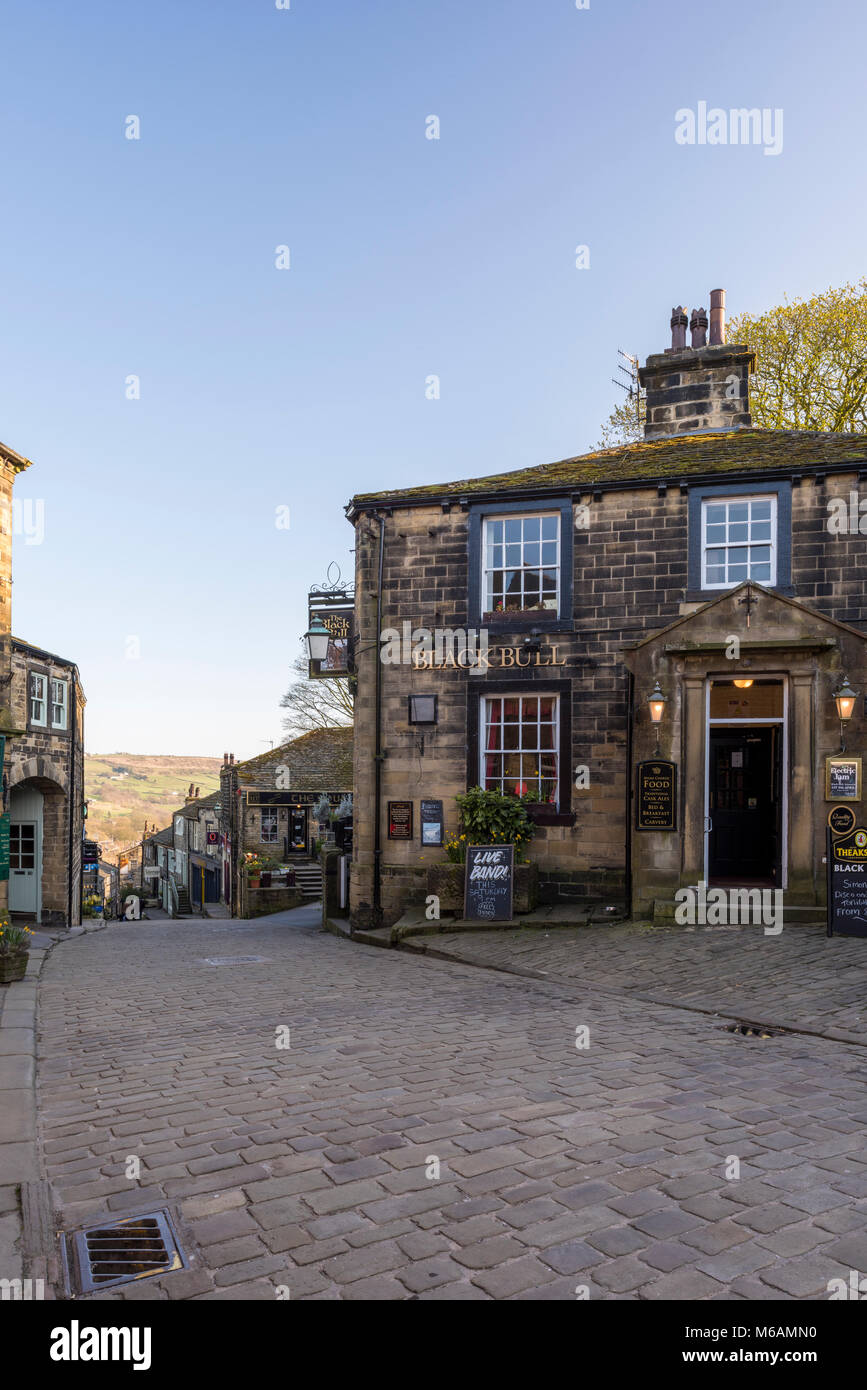 Haworth village where Bronte sisters lived, view down steep, quaint ...